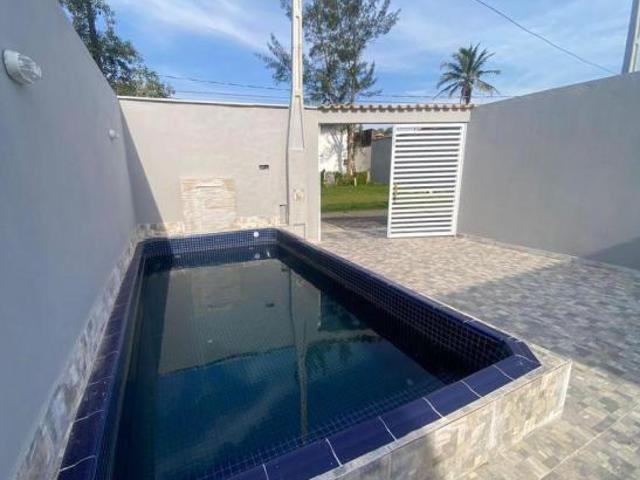 CASA COM PISCINA A VENDA NA PRAIA EM ITANHAÉM/SP
