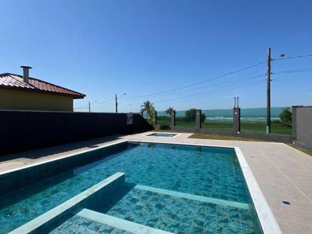 CASA COM PISCINA A VENDA NA PRAIA EM ITANHAÉM/SP