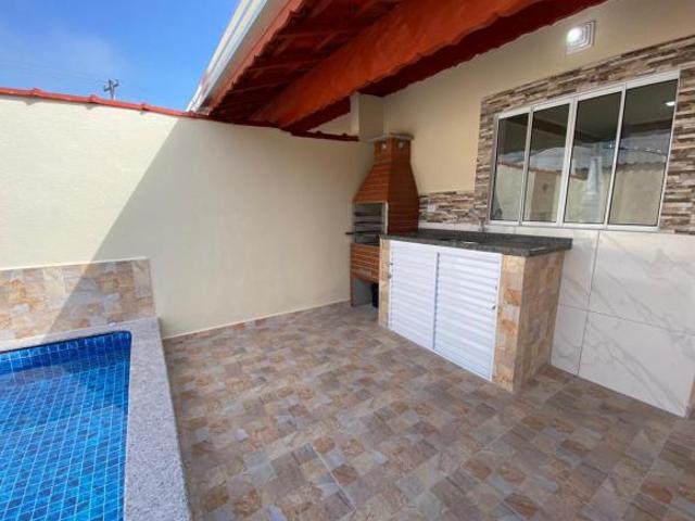 CASA COM PISCINA A VENDA NA PRAIA EM ITANHAÉM/SP