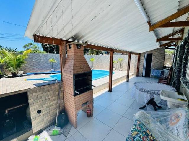 CASA COM PISCINA A VENDA NA PRAIA EM ITANHAÉM/SP