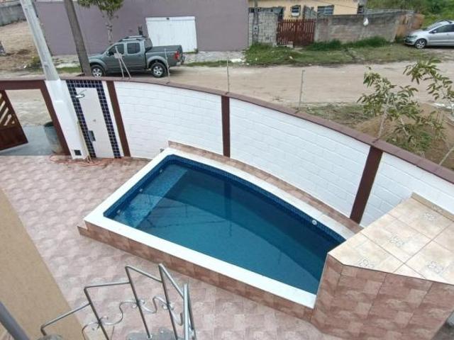 CASA COM PISCINA A VENDA NA PRAIA EM ITANHAÉM/SP