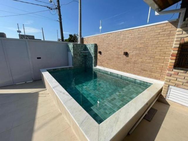 CASA COM PISCINA A VENDA NA PRAIA EM ITANHAÉM/SP