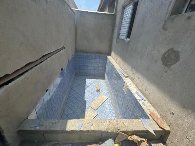 CASA COM PISCINA A VENDA NA PRAIA EM ITANHAÉM/SP