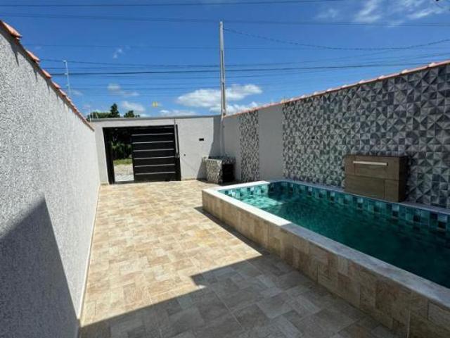 CASA COM PISCINA A VENDA NA PRAIA EM ITANHAÉM/SP