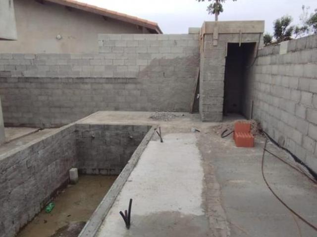 CASA COM PISCINA A VENDA NA PRAIA EM ITANHAÉM/SP