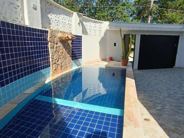CASA COM PISCINA A VENDA NA PRAIA EM ITANHAÉM/SP