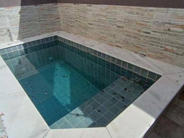CASA COM PISCINA A VENDA NA PRAIA EM ITANHAÉM/SP