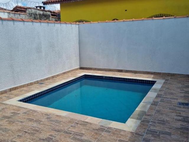 CASA COM PISCINA A VENDA NA PRAIA EM ITANHAÉM/SP