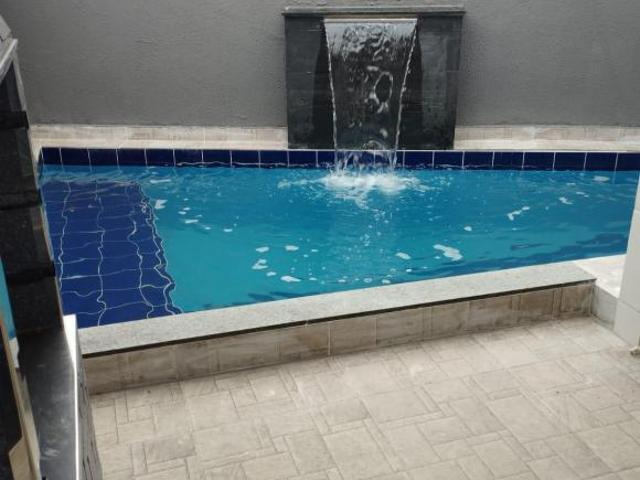 CASA COM PISCINA A VENDA NA PRAIA EM ITANHAÉM/SP