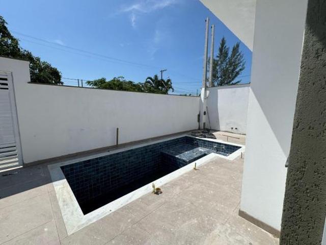 CASA COM PISCINA A VENDA NA PRAIA EM ITANHAÉM/SP