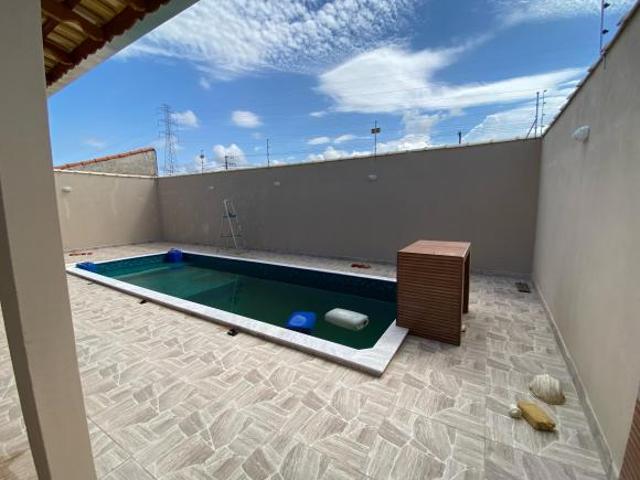 CASA COM PISCINA A VENDA NA PRAIA EM ITANHAÉM/SP