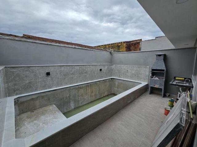 CASA COM PISCINA A VENDA NA PRAIA EM MONGAGUÁ/SP