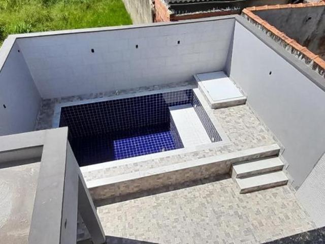 CASA COM PISCINA A VENDA NA PRAIA EM MONGAGUÁ/SP
