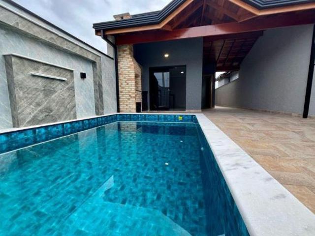 CASA COM PISCINA A VENDA NA PRAIA EM PERUIBE/SP