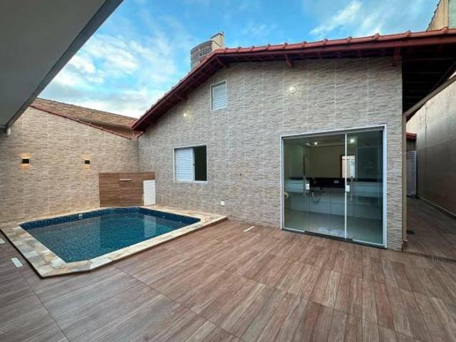 Casa com piscina, área gourmet e 4 dormitórios à venda, 195 m² por R$ 1.262.000 Ocian Praia Gran