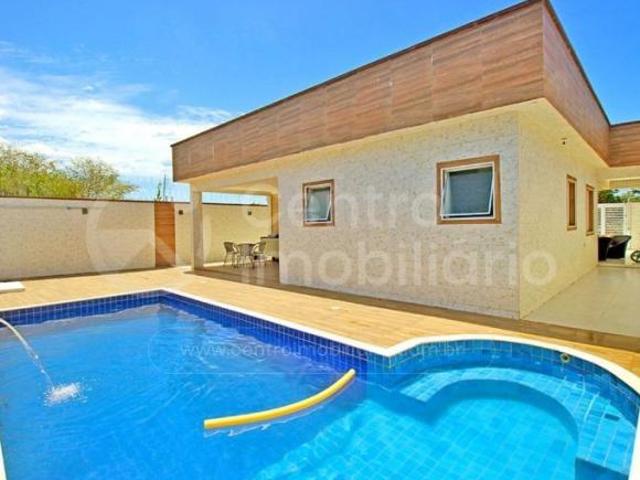Casa com piscina e 3 quartos em Peruíbe, no bairro Residencial São Luiz
