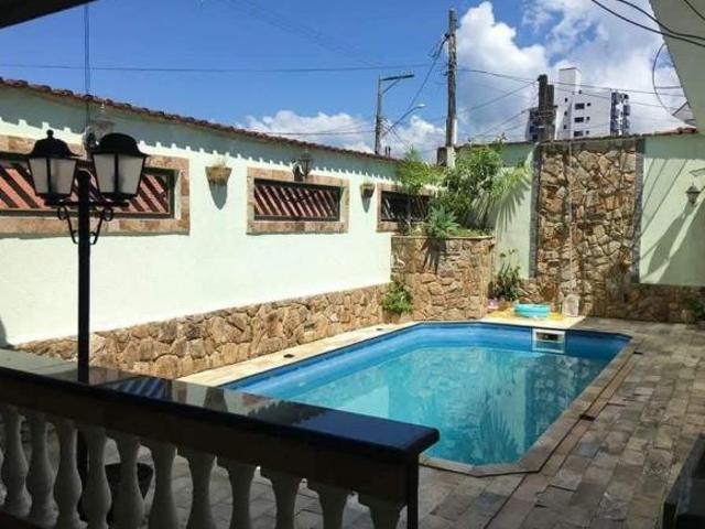 Casa com piscina e 4 suítes à venda, 134 m² por R$ 950.000 Caiçara Praia Grande/SP