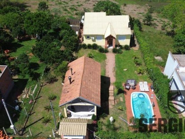 CASA COM PISCINA E QUIOSQUE A 1 KM DO ASFALTO E 3 KM DO POLO PETROQUIMICO DE TRIUNFO RS
