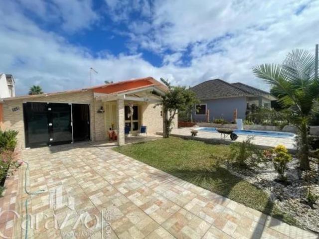 Casa com piscina em Nova Tramandaí