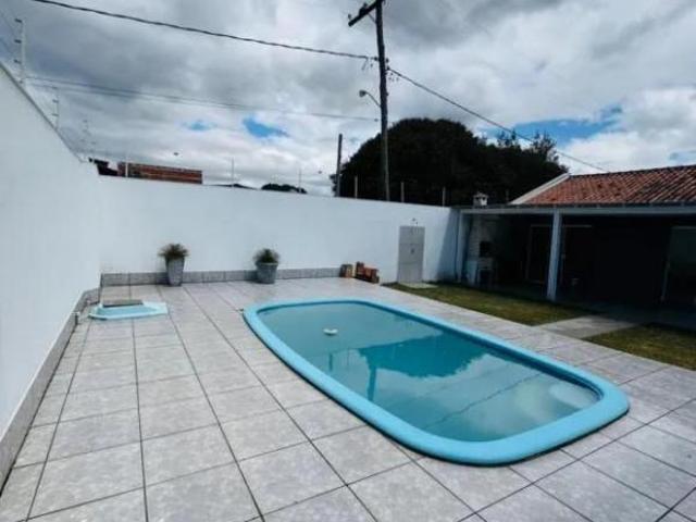 Casa com piscina em Nova Tramandaí