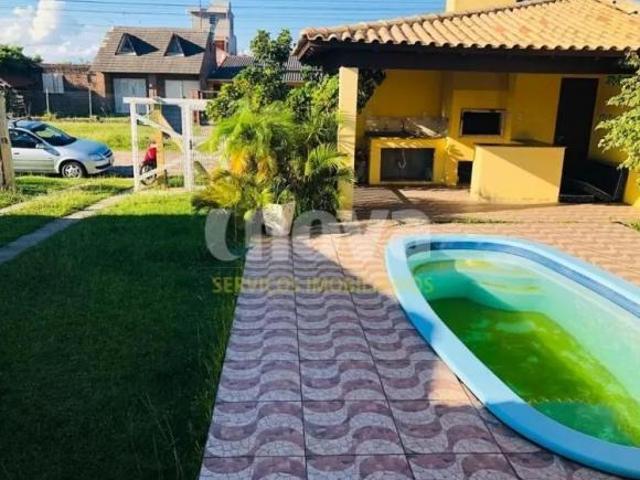CASA COM PISCINA EM NOVA TRAMANDAÍ