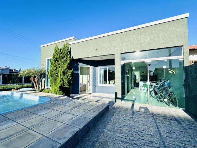 Casa com Piscina em Atlântida Sul
