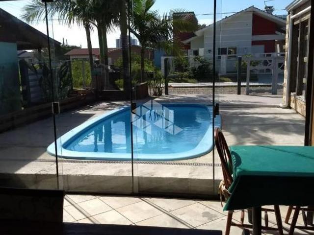 Casa com piscina em Arroio do Sal