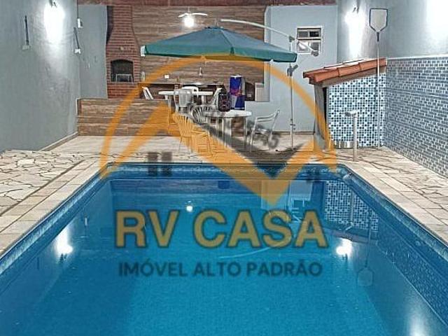 Casa com piscina lado praia em Itanhaém VENDA