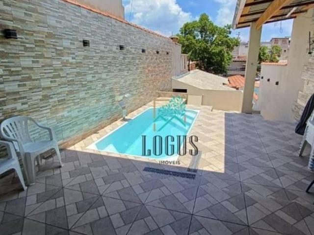 Casa com piscina, varanda gourmet e 2 dormitórios à venda, 180 m² por R$ 595.000 Vila Luzita Sa