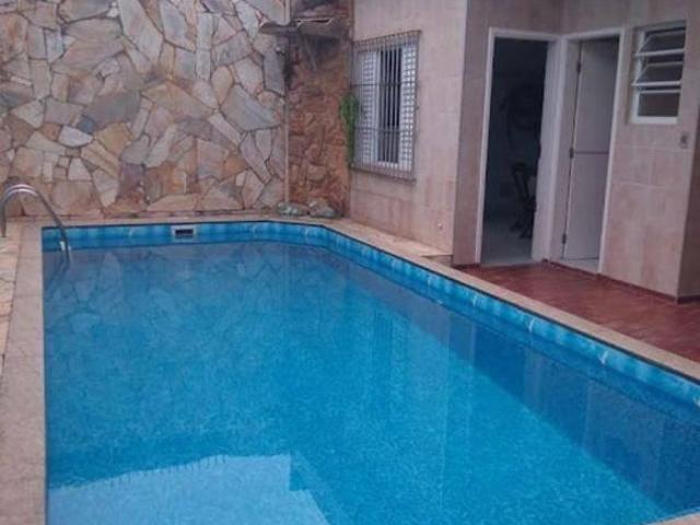 Casa com piscina, 02 dormitórios à venda, 115 m² por R$ 750.000 Ocian Praia Grande/SP
