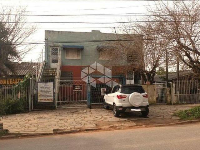 Casa com possibilidade de loja comercial em ótima localização Bairro Camaquã