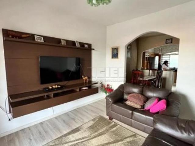 Casa com prédio comercial no Altos de Santana