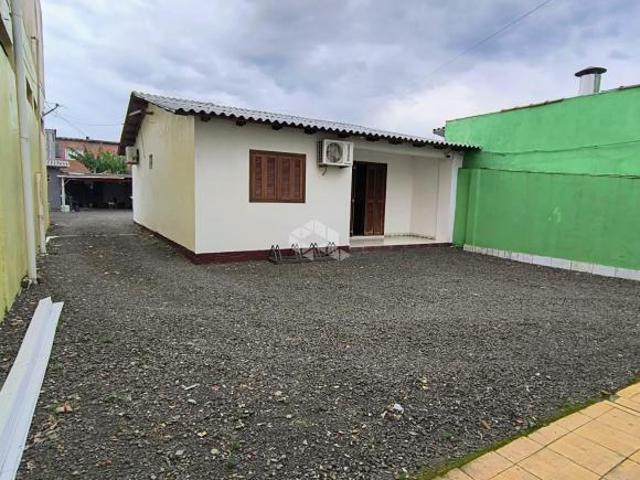 CASA COM PRÉDIO COMERCIAL ANEXO