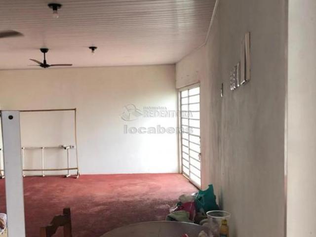 Casa com salão Venda