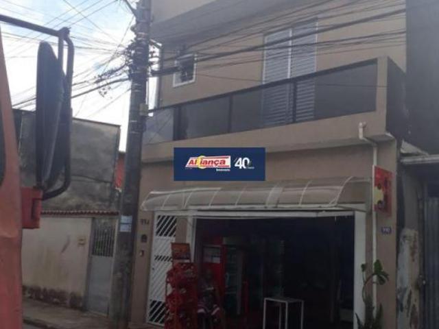 Casa com salão comercial