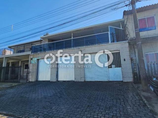 Casa com sala comercial no Tatuquara, em Curitiba