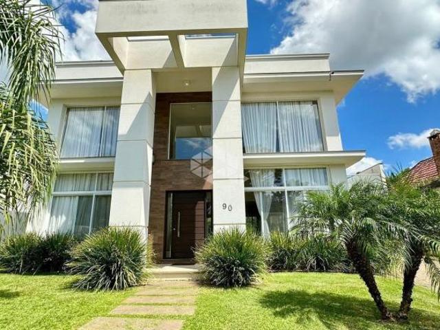 Casa com suíte e piscina em condomínio em Santa Cruz do Sul 03 dormitórios