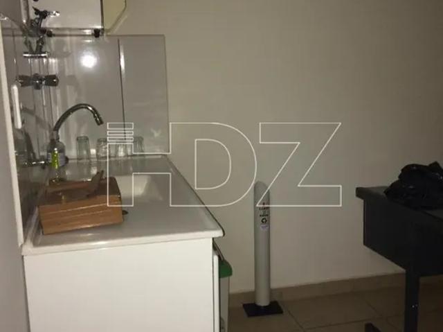 Casa comercial com 5 salas no centro