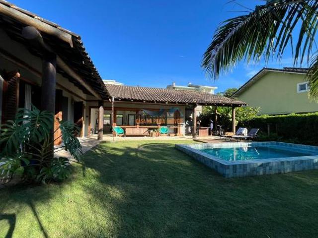 Casa conceito aberto em condomínio fechado