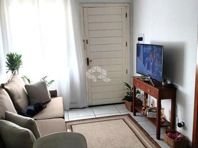 Casa Condomínio 2 dormitórios pátio churrasqueira 1 garagem