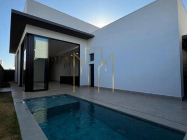 Casa Condomínio Arts à venda em Uberlândia MG: 3 quartos, 3 suítes, 5 vagas de garagem, 252m²!