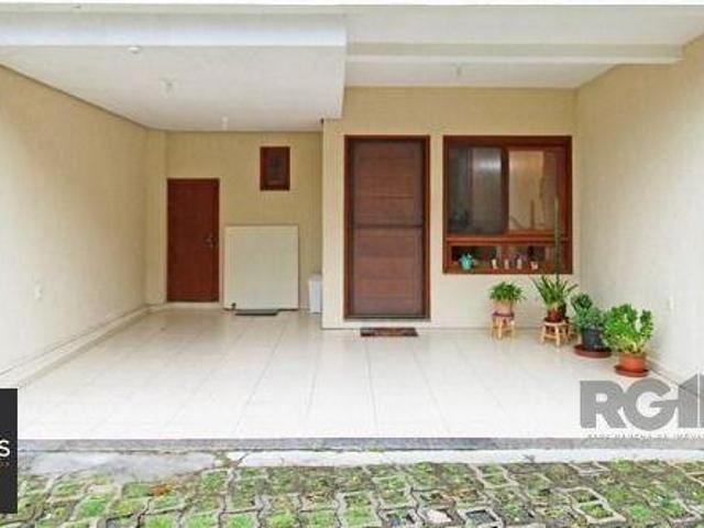 Casa Condomínio em Porto Alegre, no bairro Tristeza, com 3 dormitório s, à vend