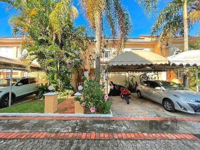 Casa Condominio em Porto Alegre, no bairro Tristeza, com 3 dormitório s, e 3 banheiros, à venda