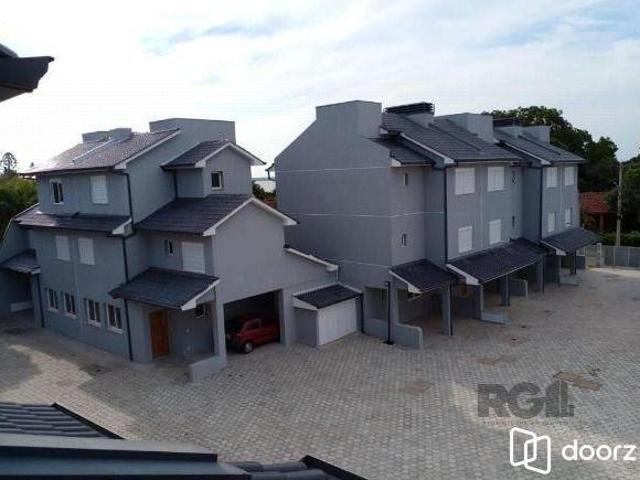 Casa Condominio em Porto Alegre, no bairro Tristeza, com 4 dormitório s, e 4 ba