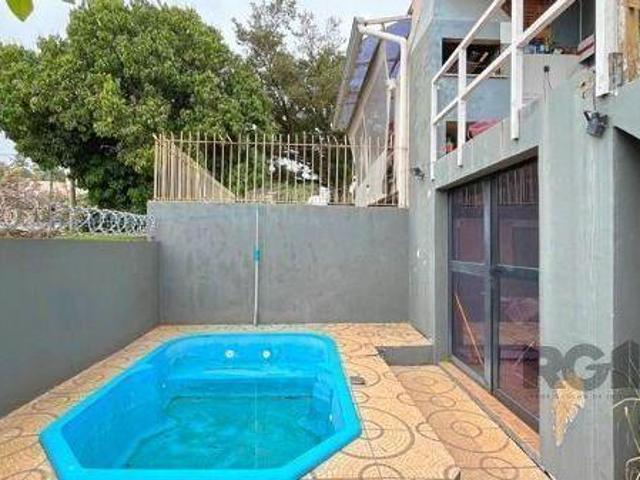 Casa Condominio em Porto Alegre, no bairro Campo Novo, com 3 dormitório s, e 3