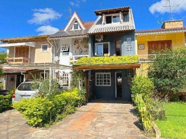Casa Condominio em Porto Alegre, no bairro Cavalhada, com 3 dormitório s, e 3 b