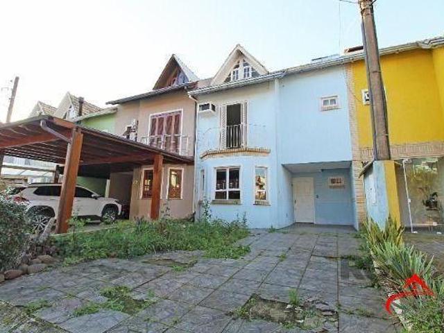 Casa Condominio em Porto Alegre, no bairro Guarujá, com 3 dormitório s, e 3 ban