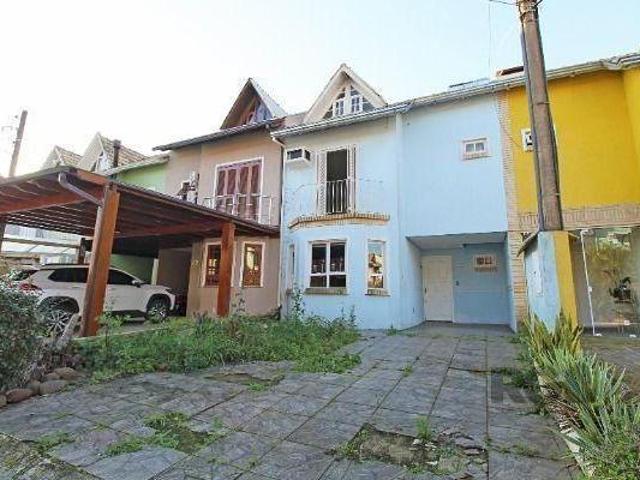 Casa Condominio em Porto Alegre, no bairro Guarujá, com 3 dormitório s, e 3 ban