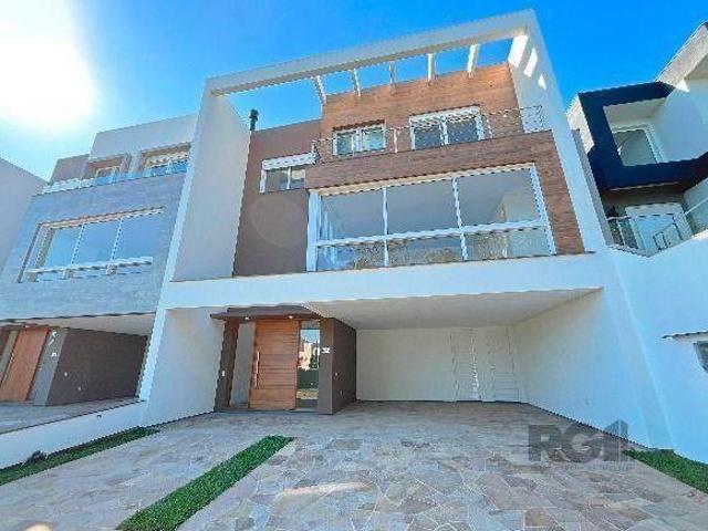 Casa Condominio em Porto Alegre, no bairro Hípica, com 3 dormitório s, e 3 banh