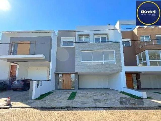 Casa Condominio em Porto Alegre, no bairro Hípica, com 3 dormitório s, e 3 banh
